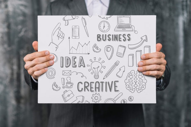 Free Businessman Showing Paper Template Psd – CreativeBooster