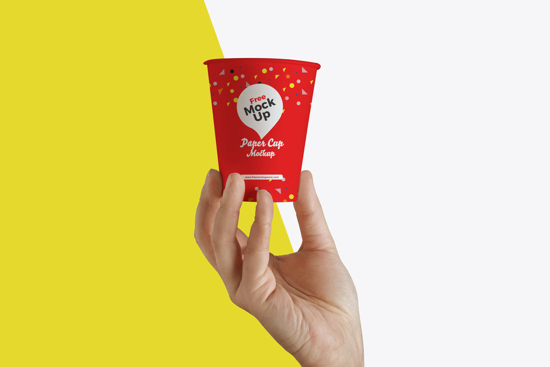 Free Hand Up Holding Paper Cup Mockup – CreativeBooster