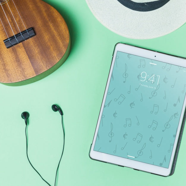 Free Music Mockup With Earphones And Tablet Psd – CreativeBooster
